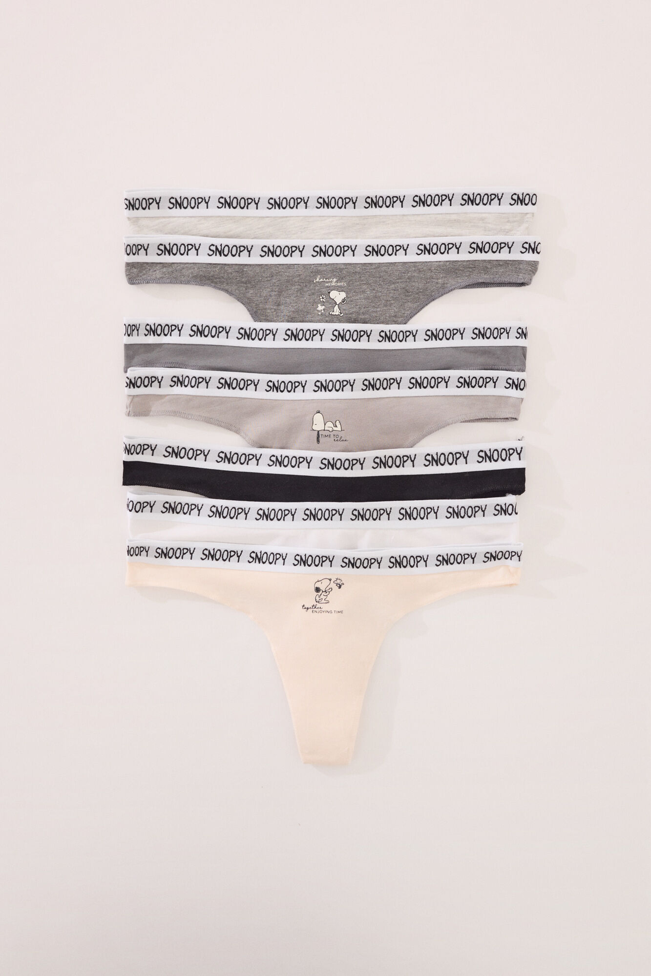 Packung mit 7 mehrfarbig Snoopy- Strings | Slips für Damen | WomenSecret